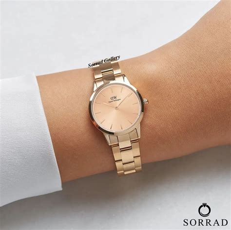 ساعت دنیل ولینگتون زنانه ساده بند استیل رنگ رزگلد صفحه رزگلد