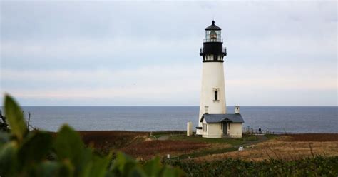 At 150 Yaquina Head Lighthouse Stands As A Monument To Another Era On