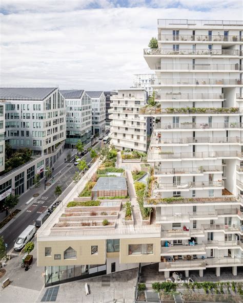 O4a Features Balconies Around Social Housing Stacked Over School In Paris