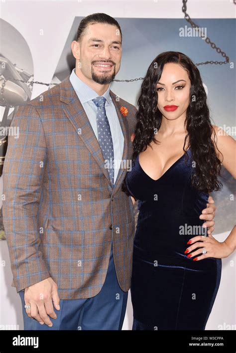 Hollywood Ca July 13 Roman Reigns L And Galina Becker Attend The