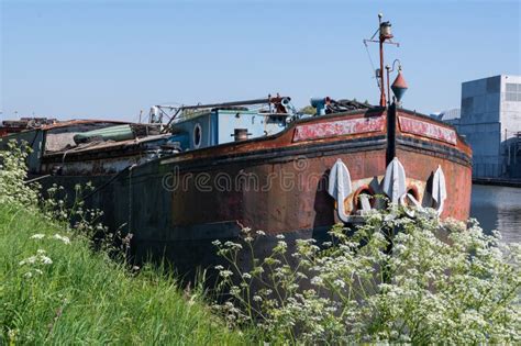 A Rusty Old Boat That Has A Few Anchors On It Sitting Idle Stock Image Image Of Forgotten