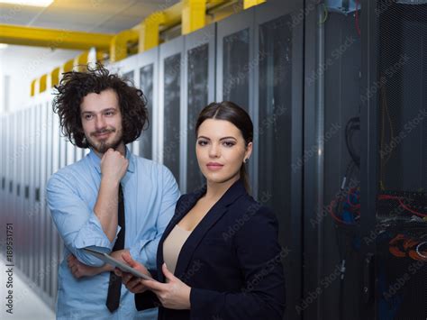 Engineer Showing Working Data Center Server Room To Female Chief Stock Photo Adobe Stock