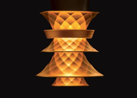 Plumen Designs Bulb With Faceted Gold Shade On The Inside