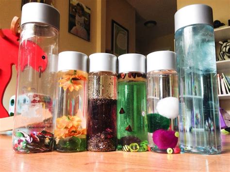Diy Sensory Play Bottles 1 Sequence 2 Flowers Rocks Colored Stones