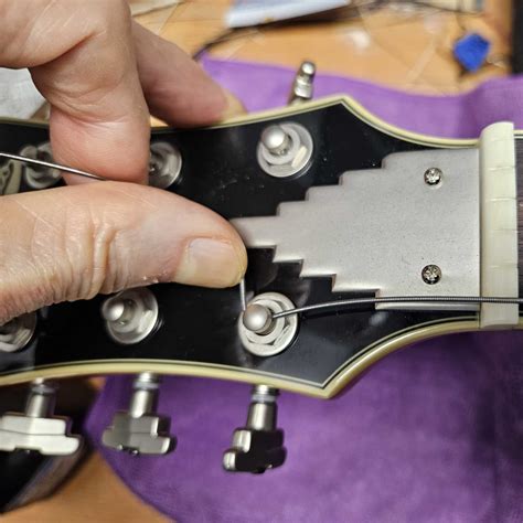 1 re stringing guitars guitar tech academy
