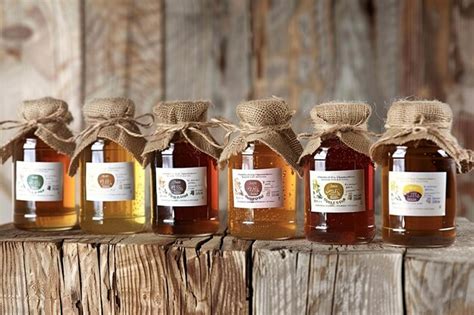 Premium Photo Honey Jar With A Label Showcasing Different Honey Varieties