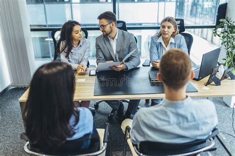 Human Resource Team Talking To A Candidate During A Job Interview In
