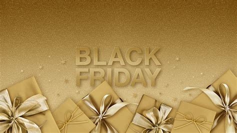 블랙 프라이데이 텍스트와 선물 상자는 골드 반짝이 반짝이는 별 질감 배경에 고립 된 황금 리본 활 티켓 선물 카드 판매 및 쇼핑을위한 광고 배너 전단지 또는 라벨 템플릿