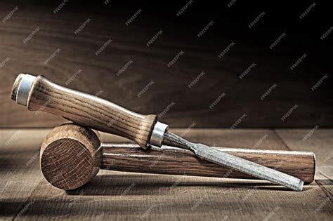 Premium Photo Chisel And Small Wooden Malet On Vintge Wood