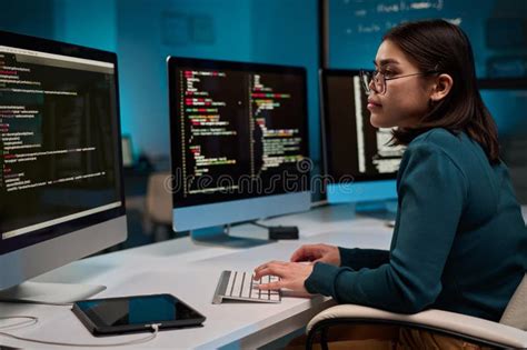 Female Computer Programmer Typing At Keyboard Stock Image Image Of