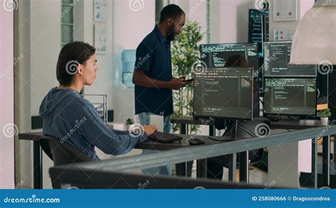 Database Programer Developing Source Code And Cloud Computing Stock
