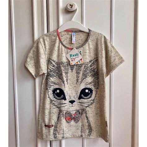 کمدا قیمت و خرید تیشرت دخترونه کاملا نو رنگ سفید سایز 46 سال