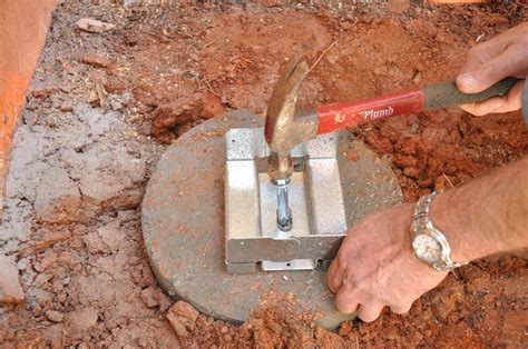 Attaching Deck Post Bases To Concrete Decks Com Deck Footings Deck Posts Diy Concrete Patio