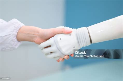 technician testing robotic bionic arm at prosthetic manufacturing stock