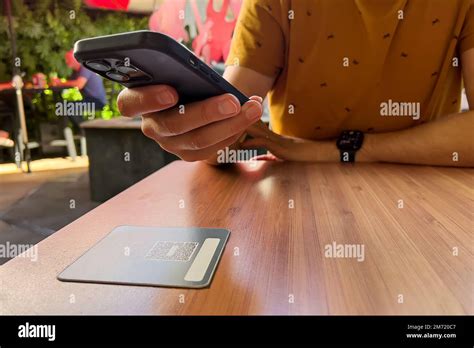 Man Scanning Qr Code From The Table In The Cafe Or Restaurant With His Phone Digital Menu