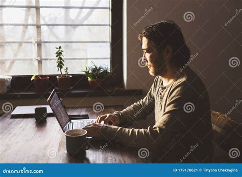 Bearded Man Working On A Laptop At Home Stock Image Image Of Indoors Modern 179170621