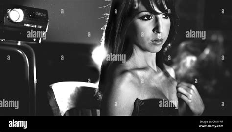 Girl Views A Slide Projector Stock Photo Alamy