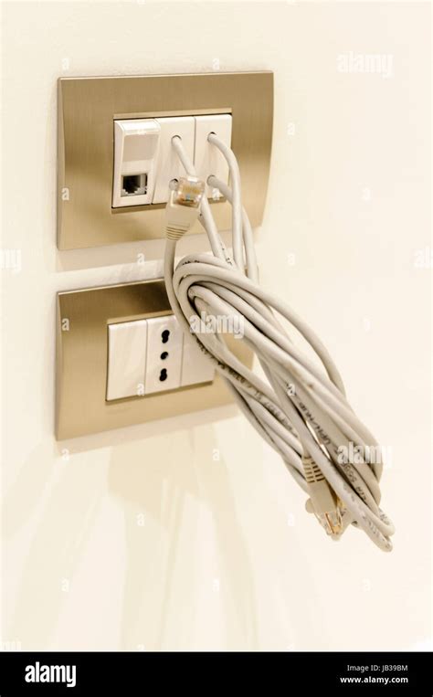 European Electrical Socket And Ethernet Socket On The Wall With Ethernet Cable Stock Photo Alamy