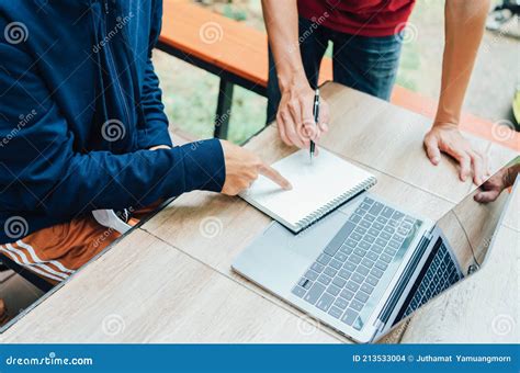 group developer programming hand pointing display coding technology