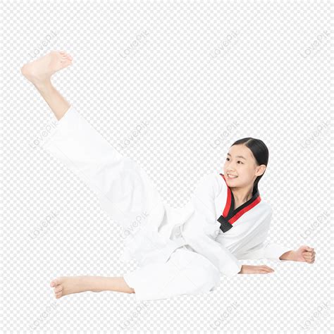 Teenage Girls Practicing Taekwondo Kicks Teenage Girls Practicing