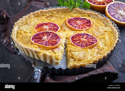 Traditional French Tart Au Citron With Blood Orange Slices Served As