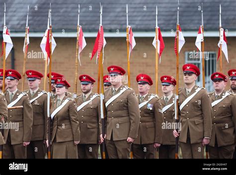 Members Of The Royal Lancers Standing To Attention Ahead Of A Visit By