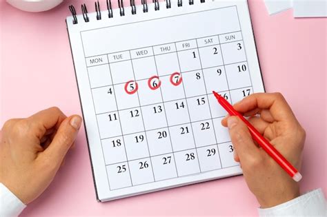 Premium Photo Calendar With Marked Dates Of Menstrual Days