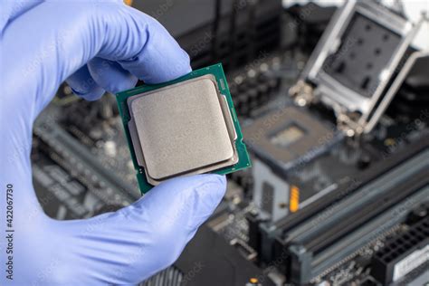 Plug In CPU Microprocessor To Motherboard Socket Technological Background Concept Computers