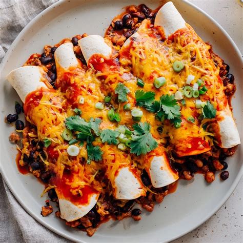 Hearty Mexican Cheesy Bean Enchiladas