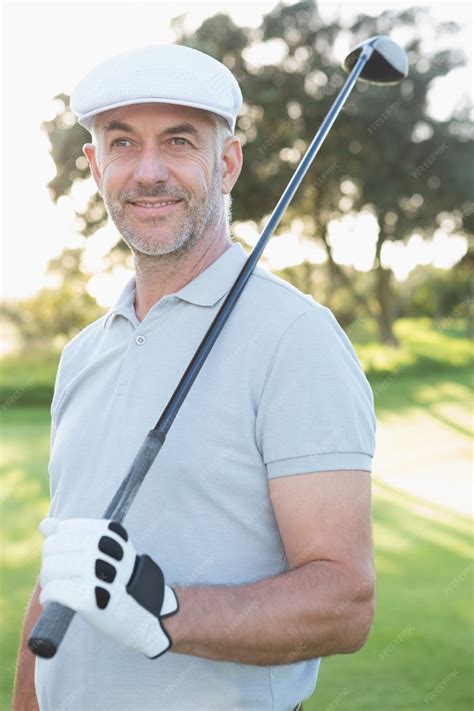 Premium Photo Smiling Handsome Golfer Looking Up
