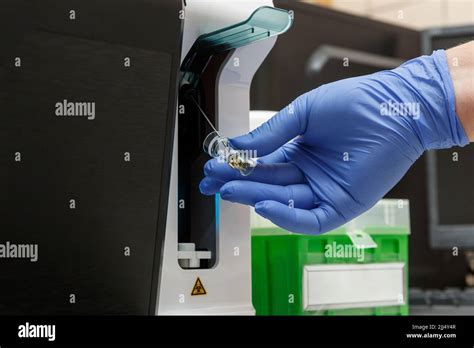 Laboratory Worker Using Fully Automated Clinical Chemistry System