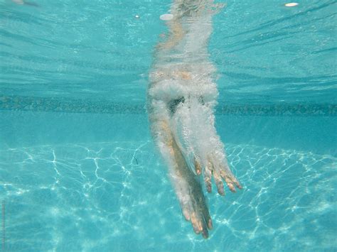 Babe Man Jumps In Pool By Stocksy Contributor Jesse Morrow Stocksy