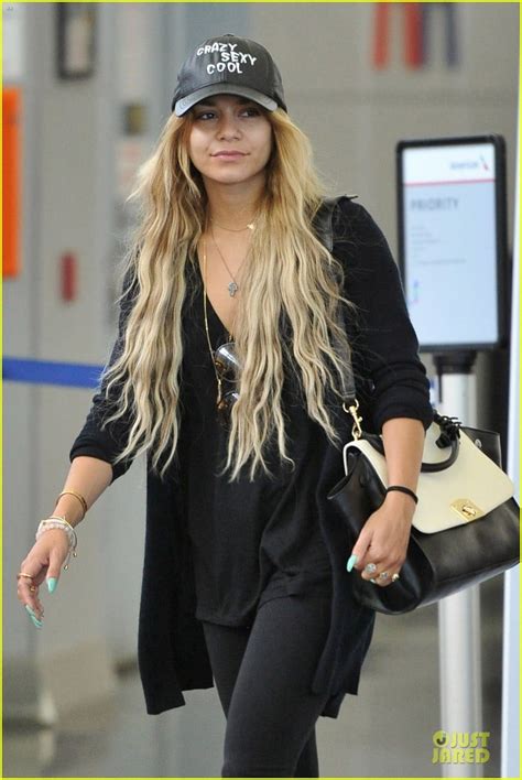 Vanessa Hudgens Sunglasses Make Her Look Red Hot At Lax Airport