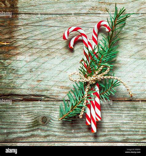 Colorful Striped Red And White Christmas Candy Canes Tied In A Bundle