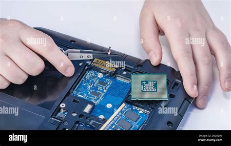 Technician Fixing Computer Repair And Upgrade Concept Of Laptop Workshop Background Stock