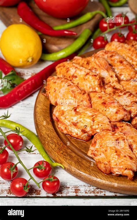 Chicken Wings With Sauce On Wood Background Raw Chicken Wings With