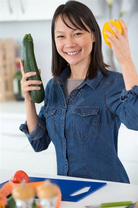 Woman Man And Cucumber With Pepper Photo Picture And Hd Photos Free Download On Lovepik