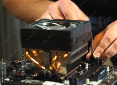 Installing The Cooler On The Processor The Assembly Of A Personal Computer Workshop Stock