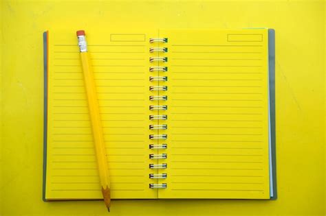 Premium Photo Yellow Color Notepad