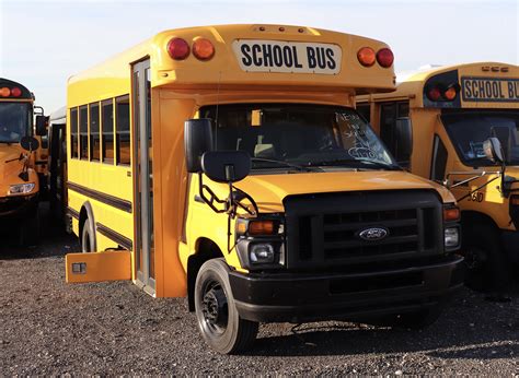 Yellow School Buses Parked Together