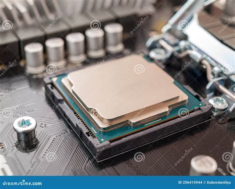 The Process Of Connecting The Cpu To The Processor Socket On A Modern Computer Motherboard