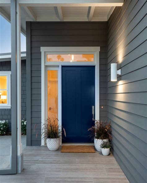 Coastal Living Beautiful Grey House With Dark Blue Front Door