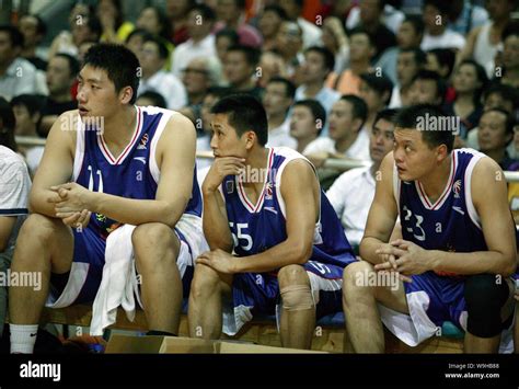 From Left Chinas Tang Zhengdong Hu Xuefeng And Zhang Cheng Of Jiangsu Nangang Basketball Team