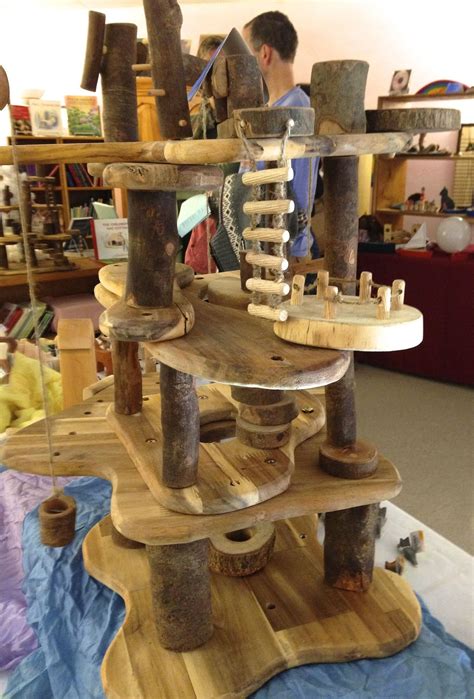This Tree House Has Several Levels With Stairs Fairy Tree Houses Tree House Fairy Tree