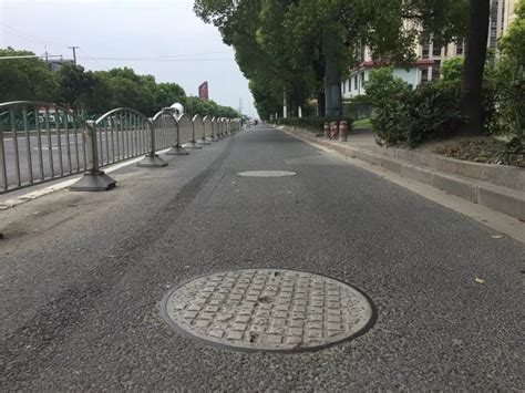 【高境街拍】逐步整治井盖路面高差，折射城市管理“绣花精神”！ 道路