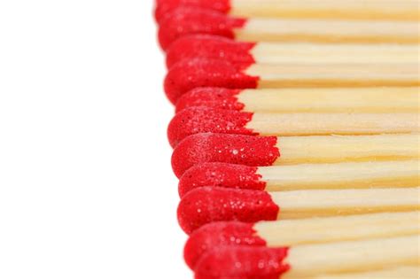 Premium Photo Matches With A Red Head On A White Background