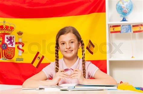 Cute Schoolgirl Learning Spanish At The Classroom Stock Image Colourbox