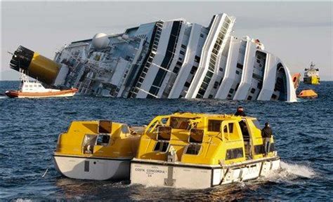 Cruise Ship Laying On Its Side After Hitting Rock Near Italy Coastline