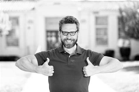 Premium Photo Happy Nerd Man In Glasses Showing Thumb Up Gesture Perfect Vision
