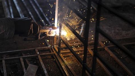 Premium Photo Cropped Hand Of Worker Welding In Workshop